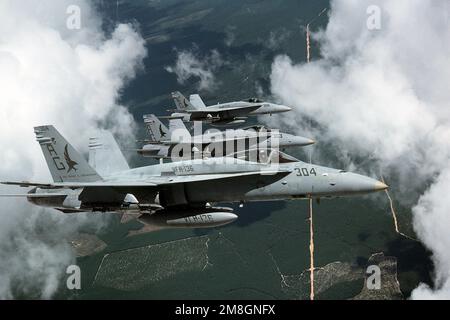 A right side view of three Strike Fighter Squadron 132 (VFA-132) F/A ...