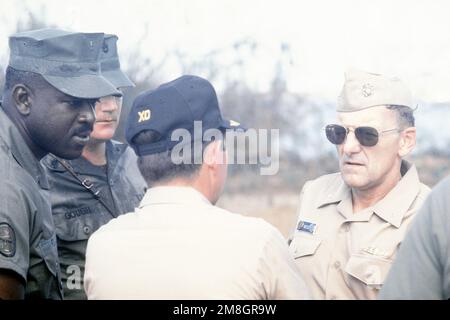 RADM William Retz, commander, Naval Base, Pearl Harbor, and CAPT ...