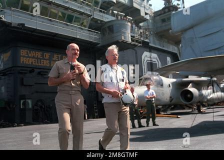 CAPT. Dennis V. McGinn, commanding officer of the aircraft carrier USS ...