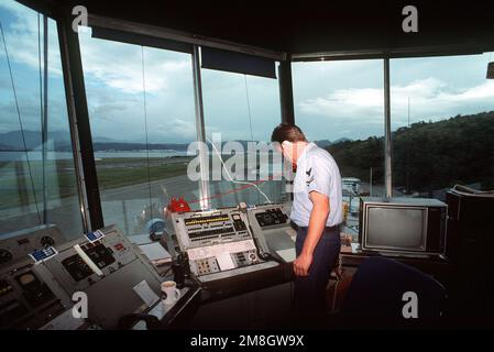 Air controlman 2nd Class John Mahr instructs SSGT Roque Exconde on U.S ...