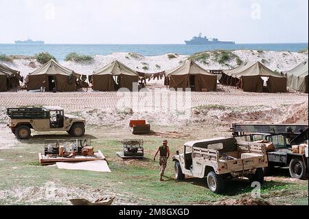 U.S. Marine amphibious troop carriers ford river south of Da Nang on ...