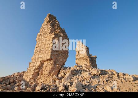 Caudilla castle in ruins in a sunny field at sunset in spring.Toledo ...