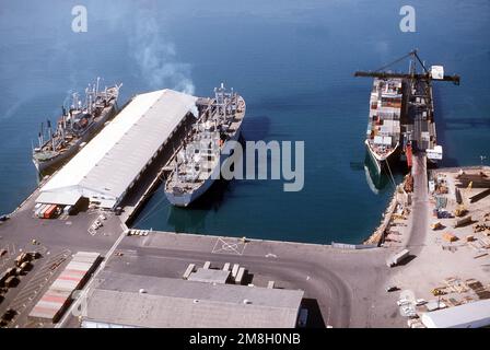 A view of three ships moored at the depot. The ships are, from top to ...