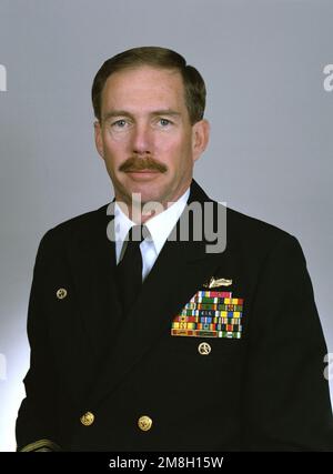 Rear Adm. (lower half) Richard A. Riddell, USN (covered). Country ...
