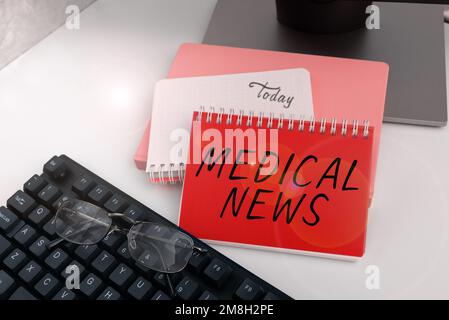 Hand writing sign Medical News. Concept meaning report or noteworthy ...