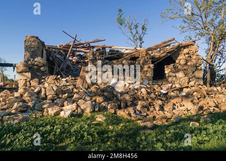 Countryside. Destroyed house after the battle. War in Ukraine. Russian ...