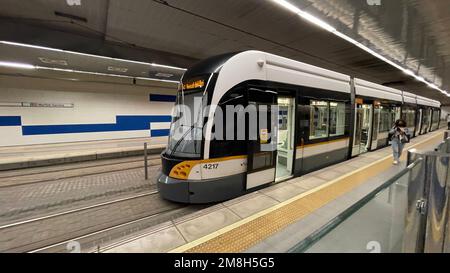 Valencia tram circulating through the station Stock Photo - Alamy
