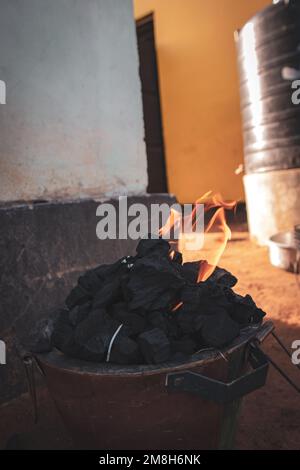 Charcoal background illuminated with red light underneath Stock Photo ...