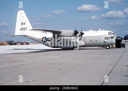 Right side view of a C-130T Hercules aircraft taxiing down the runway ...