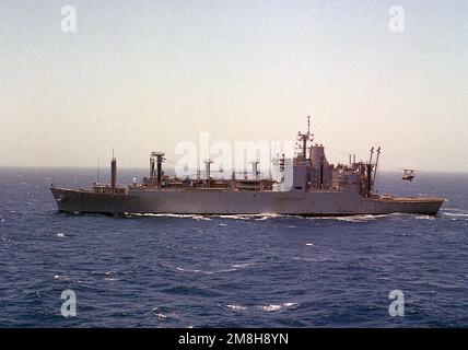 A port beam view of the ammunition ship USS BUTTE (AE-27) underway ...