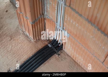 cable canal for eletric installation at the construction site with red ...