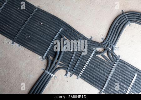 cable canal for eletric installation at the construction site with red ...