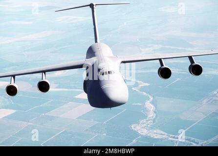 An air-to-air front view of a C-5B Galaxy aircraft of the 22nd Military ...