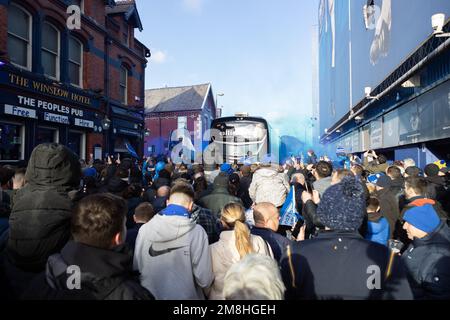 Everton fan's follow the team bus before the Premier League match ...