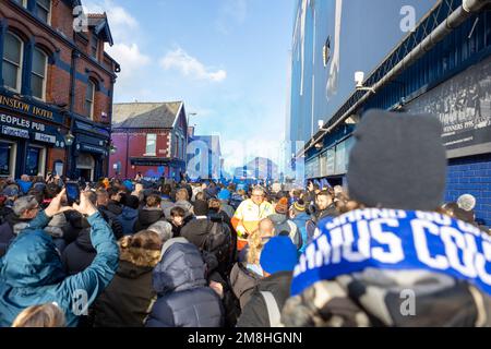 Everton fan's follow the team bus before the Premier League match ...
