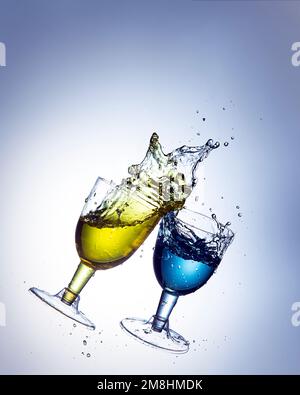 Liquids: splashing two glasses together Stock Photo - Alamy