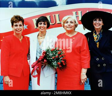 Mrs. Barbara Pope, ship's sponsor, breaks the traditional bottle of ...