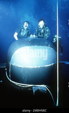 SEAL Delivery Vehicle (SDV) pilot and navigator conduct predive ...