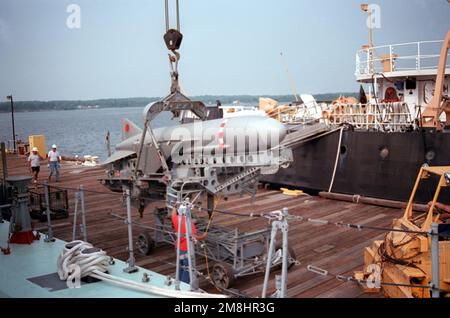A P-15 SS-N-2c Styx SSM is unloaded from the No. 4 missile tube aboard ...