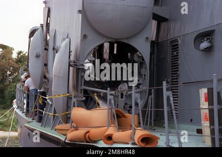 A P-15 SS-N-2c Styx SSM is unloaded from the No. 4 missile tube aboard ...