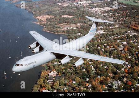 An air-to-air front view of a 438th Airlift Wing, C-141 Starlifter ...
