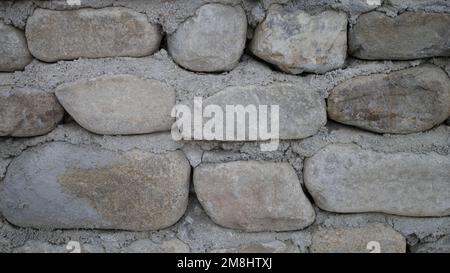 Neatly stacked rough cut stone wall seamless texture background Stock ...