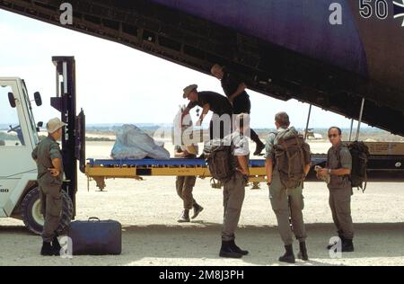 German soldiers use a forklift to unload supplies from the C-160 ...
