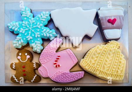 Iced Biscuits for Christmas with a winter theme Stock Photo - Alamy