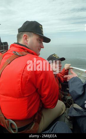 LCDR Tim Mulcare and LTJG. Drew Rainer stand the maneuvering watch on ...
