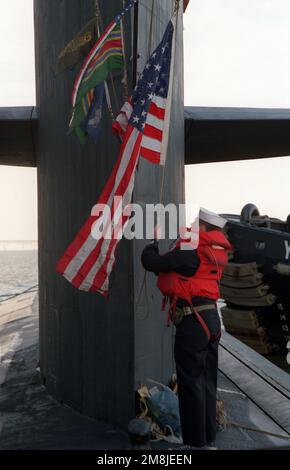 Fire Control Technician Second Class (FT2) Matthew Beaker stands watch ...