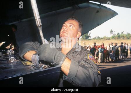 C-141 Loadmaster from the 452nd Air Mobility Wing, March Air Reserve ...
