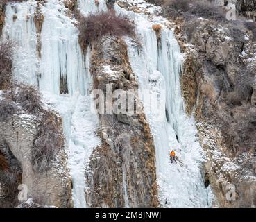 Greg Moore ice climbing Lower Falls Right which is rated WI4 Stock ...