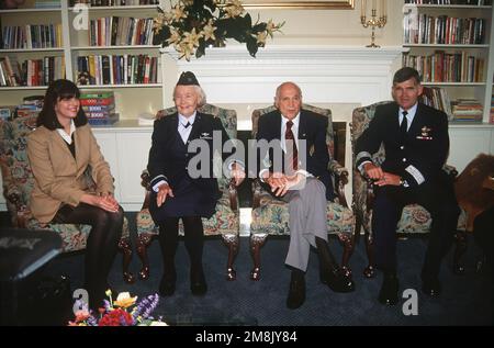 Elizabeth and Zachary Fisher are seated in the living room of the newly ...