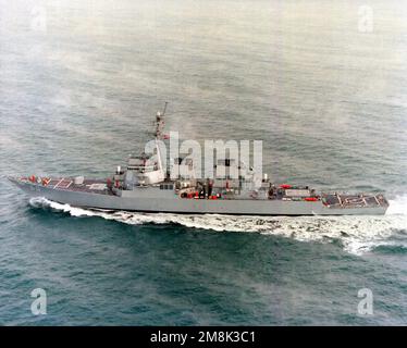 A high oblique port side view of the guided missile destroyer USS ...