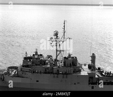 High oblique port side view of the bridge and mast of the dock landing ...