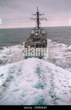 An aerial stern-on view of the guided missile destroyer USS GONZALES ...
