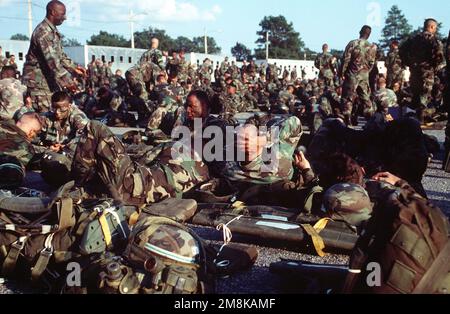 Members of the 82nd Airborne Division assemble their gear and prepare ...