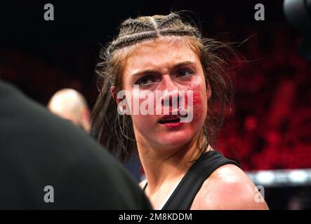Faith Ordway reacts after the referee stops the super-lightweight bout ...