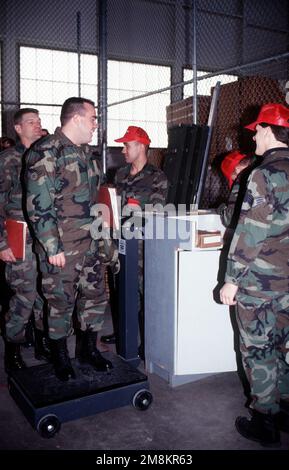 Members from the 90th Missile Wing render a salute to honor those who ...