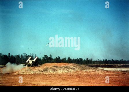 Members of the 1ST of the 5th Antiaircraft Artillery Brigade fire the ...