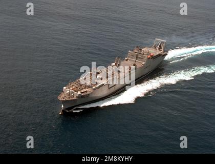 An aerial high oblique port bow view of the amphibious assault ship USS ...