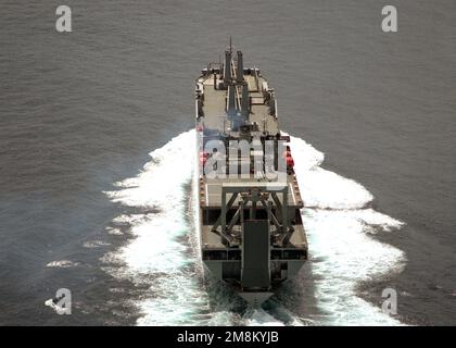 Aerial high oblique stern-on view of the guided missile destroyer USS ...