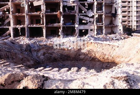 The severely bomb damaged north side of the building in the Khobar ...