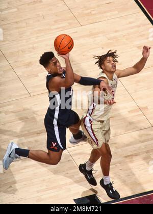 Virginia forward Jayden Gardner (1) is defended by Furman forward ...