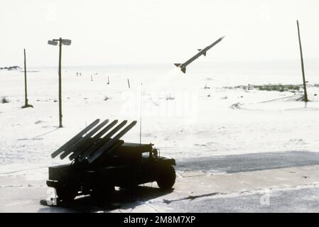 An AIM-120A AMRAMM missile is launched from a High-Mobility ...