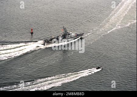 A starboard quarter view of the coastal patrol ship USS CYCLONE (PC-1 ...