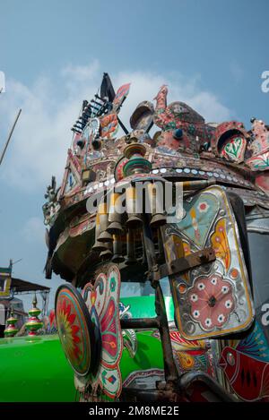 Detail of front decorations of a colorfully painted bus, Peshawar ...