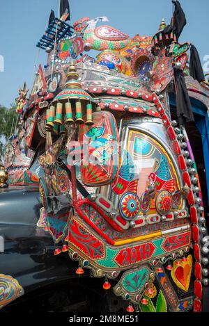 Detail of front decorations of a colorfully painted bus, Peshawar ...