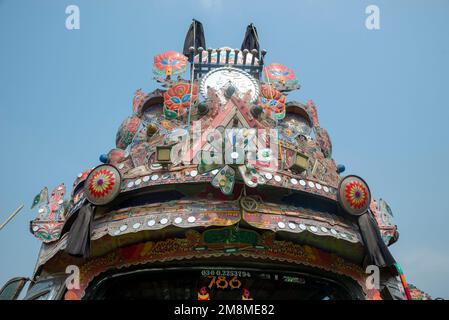Detail of front decorations of a colorfully painted bus, Peshawar ...