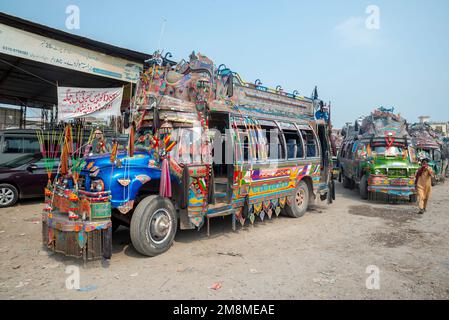 Colorfully painted buses at a bus station, Peshawar, Pakistan Stock ...